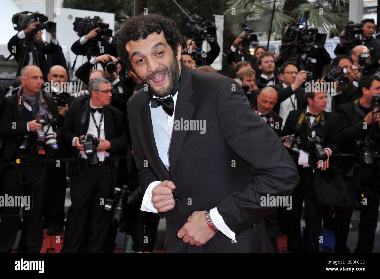 Ramzi posing before the premiere of 'Vous n'avez encore rien vu ...