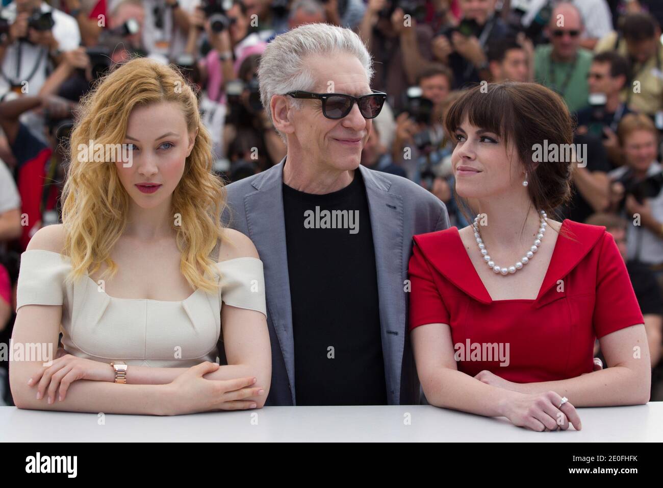 Sarah Gadon, director David Cronenberg and Emily Hampshire pose at the ...
