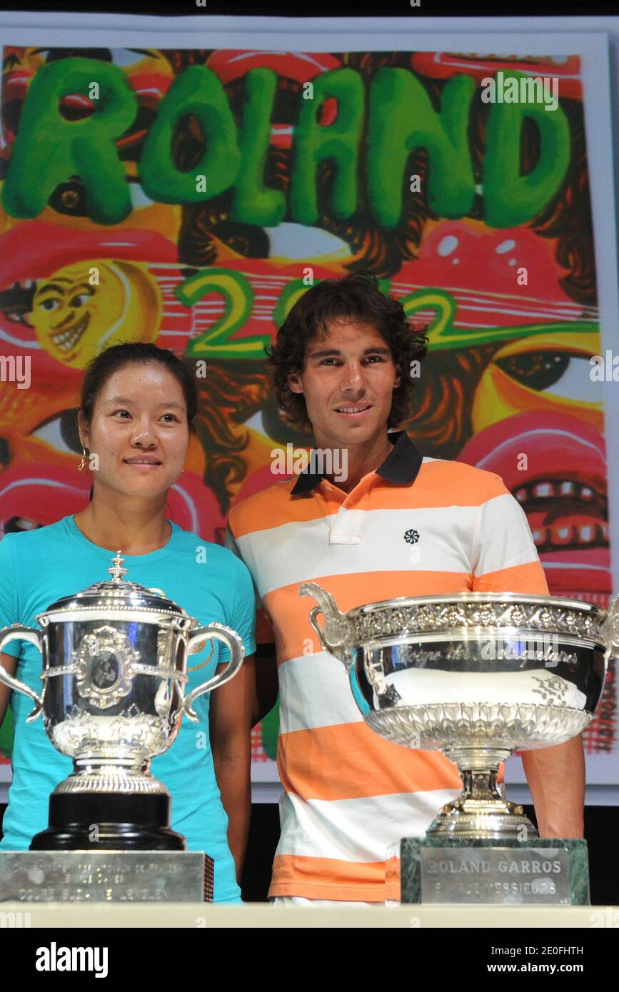 Chinese player Li Na (L) and Spanish player Rafael Nadal take part in ...