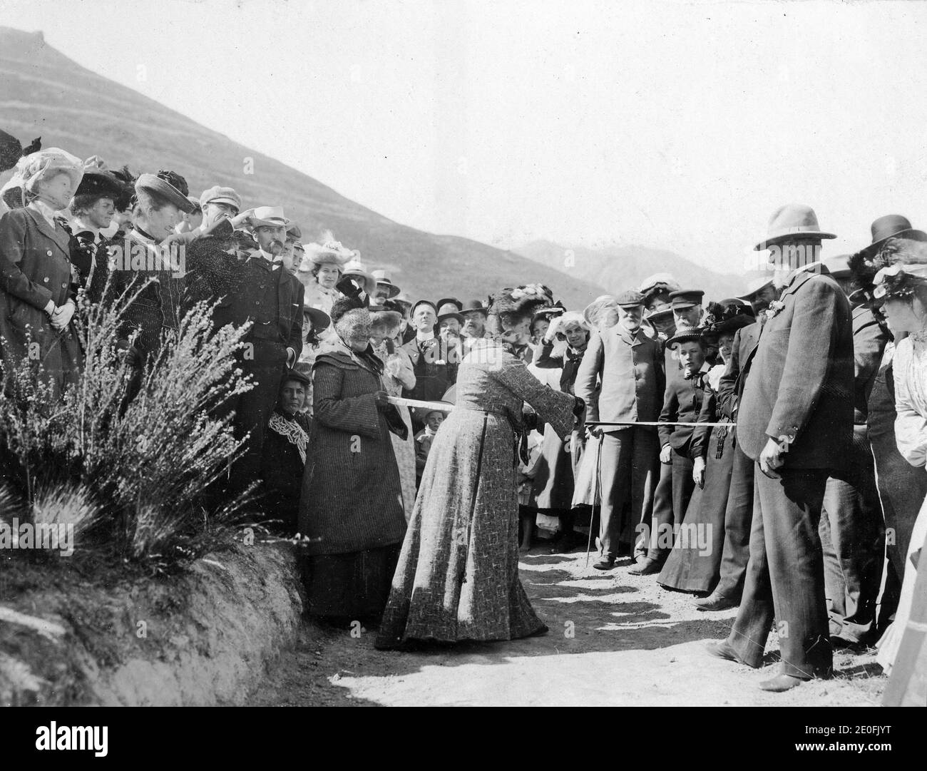 A crowd watches as Mrs Rutherford (left) opens the popular Conical Hill ...