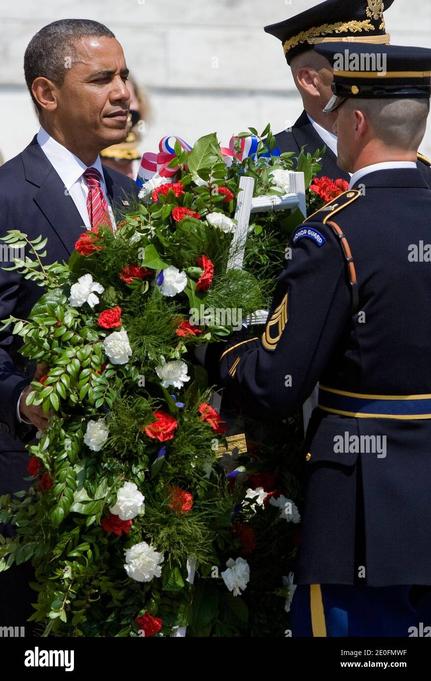 President Barack Obama participates in a wreath laying ceremony at the ...