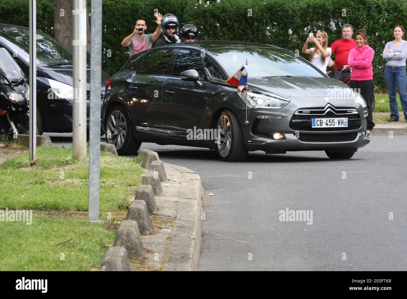 French President Francois Hollande arrives in his car, a Citroen DS5 ...