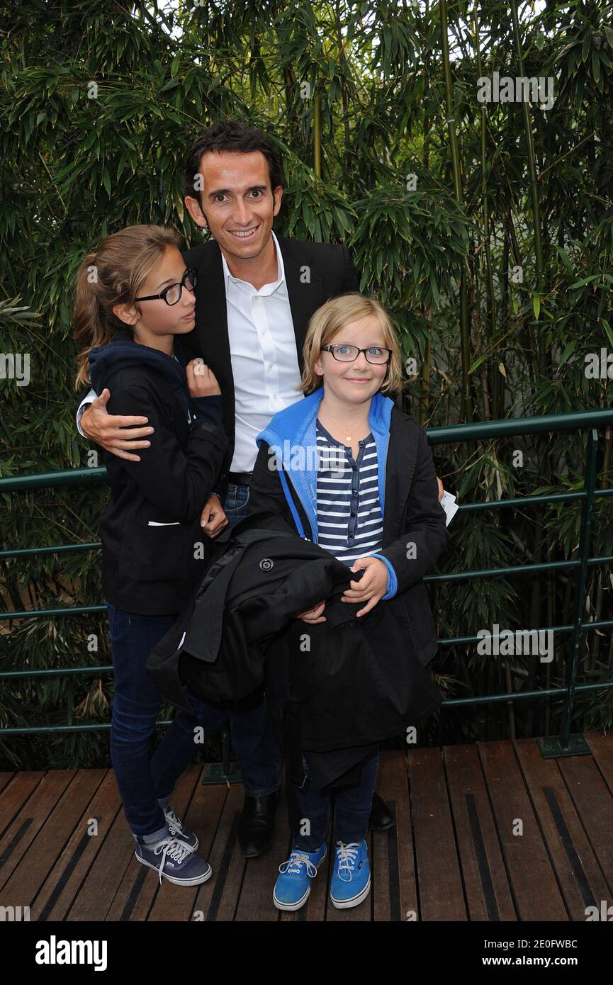 Alexandre Bompart and his daughters attending the French Tennis Open ...