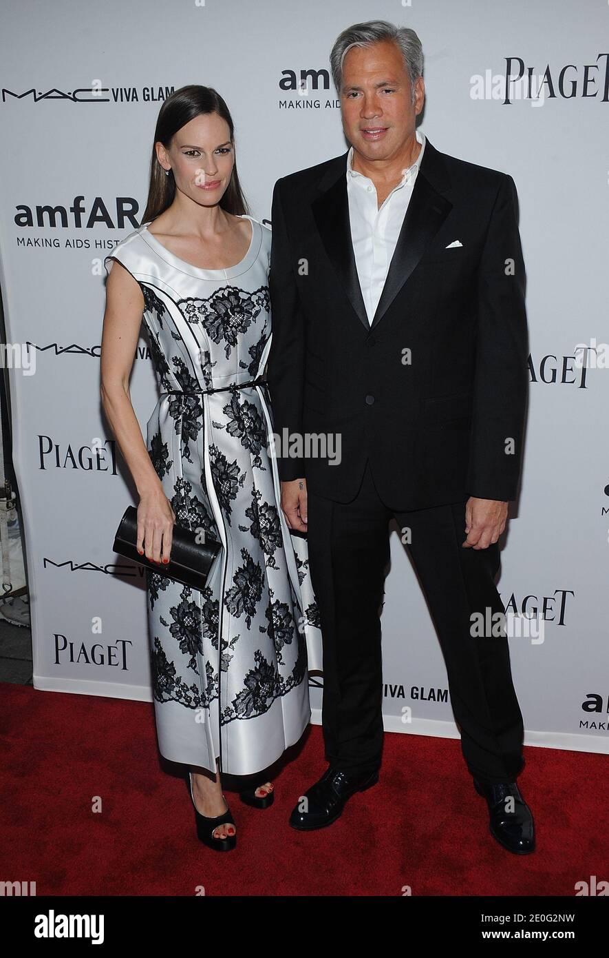 Robert Duffy and Hilary Swank attending the '2012 amfAR Inspiration ...
