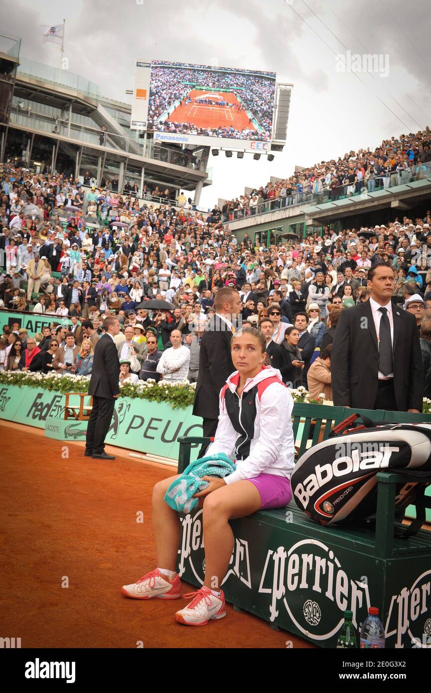 Italy's Sara Errani waits before the ceremony trophy after she lost ...