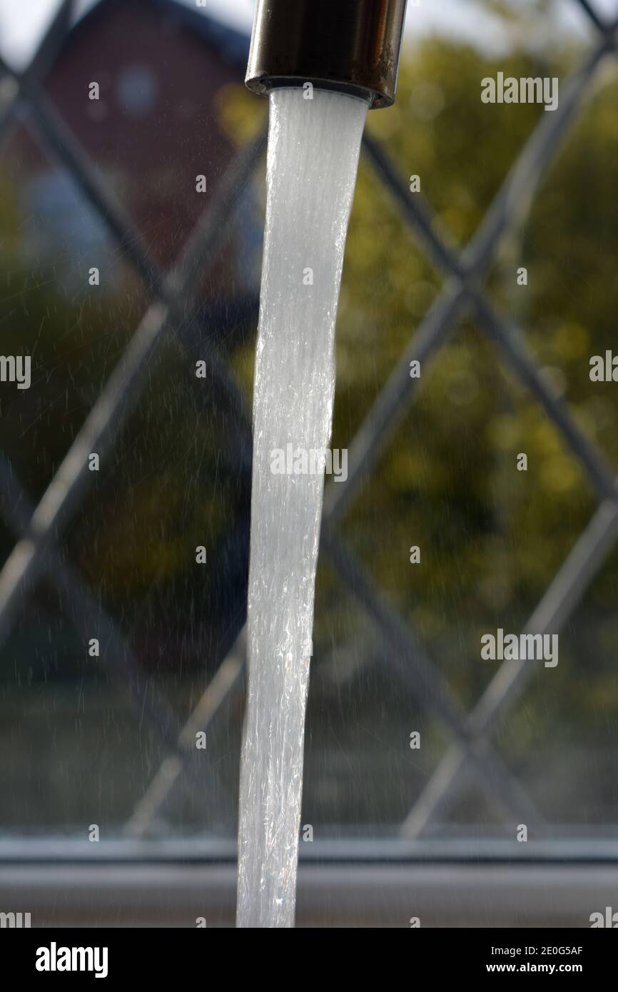 Water pouring from faucet sink hi-res stock photography and images - Alamy