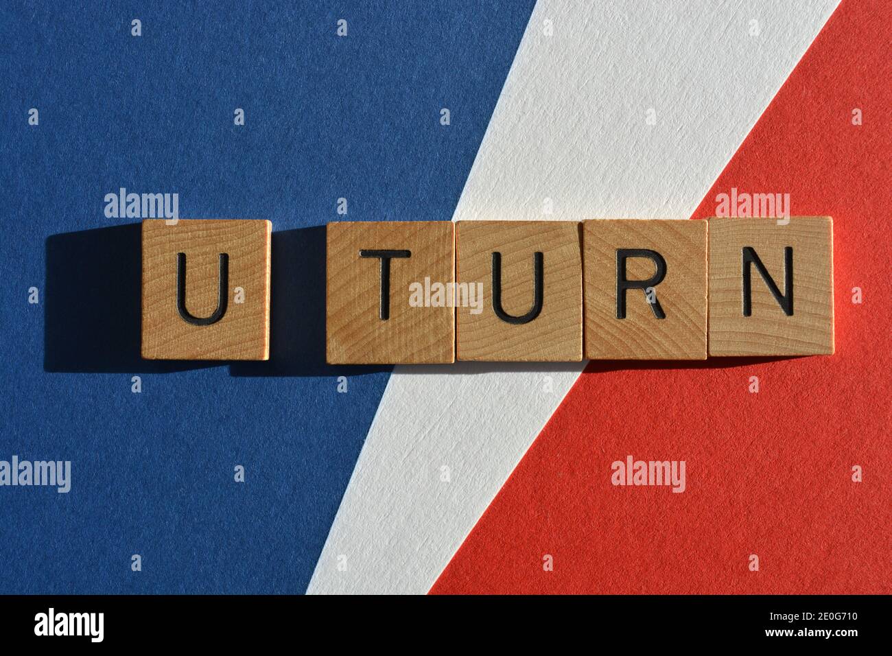U Turn, word in wooden alphabet letters isolated on red, white and blue ...