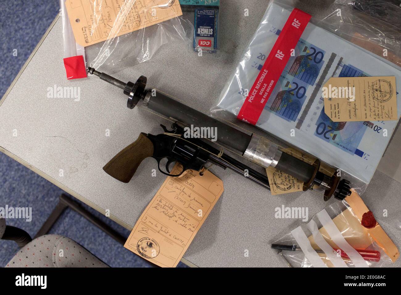 A picture shows the bundles of counterfeit bank-bill seized by the ...