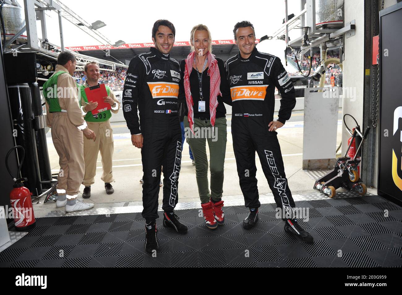 EXCLUSIVE - Estelle Lefebure is seen with pilots Roman Rusinov and ...