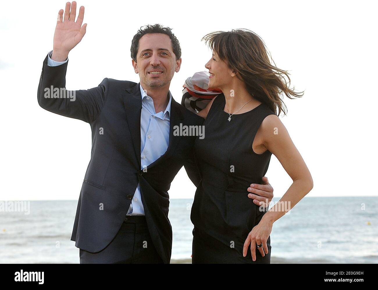 Gad Elmaleh and Sophie Marceau pose for the photcall of ' Le Bonheur N ...