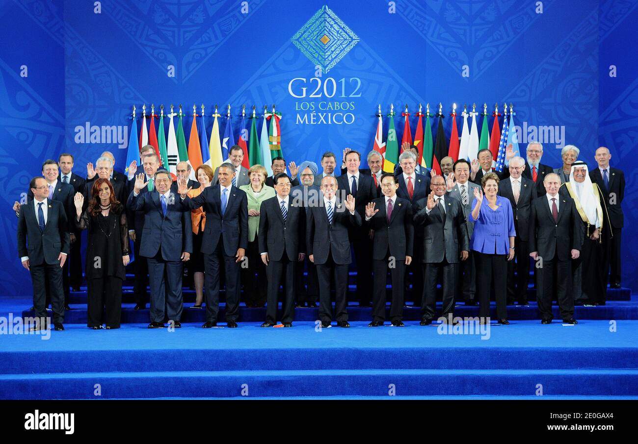 Heads of the G20 leading economies pose for a group photo at the ...