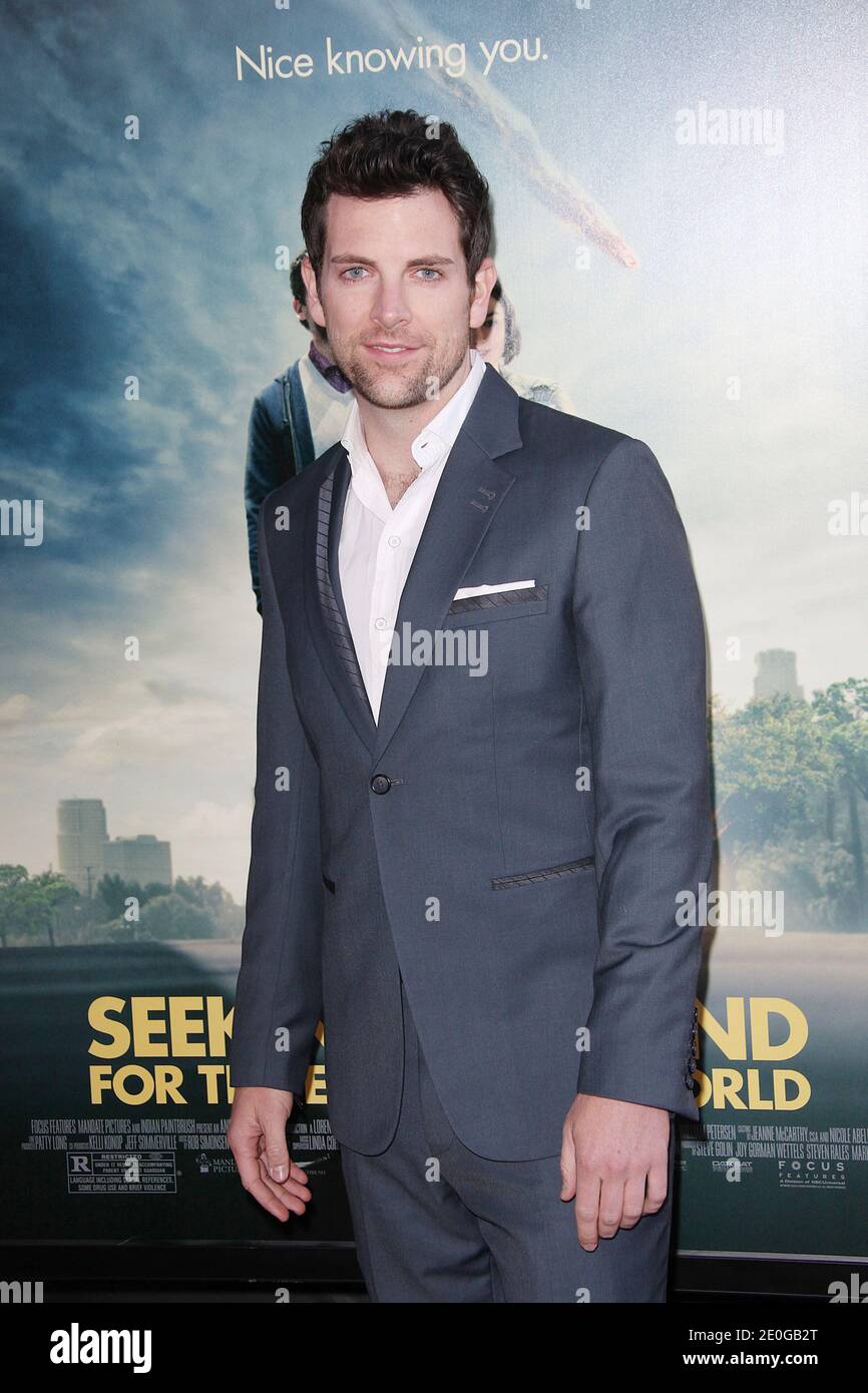 Chris Mann arriving at the premiere of "Seeking a Friend for the End of ...