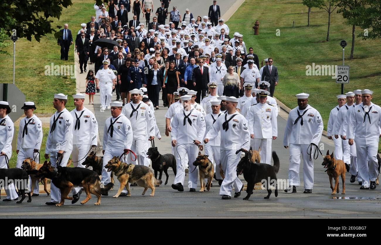 US navy military working dog handlers arrive at the burial service of U ...