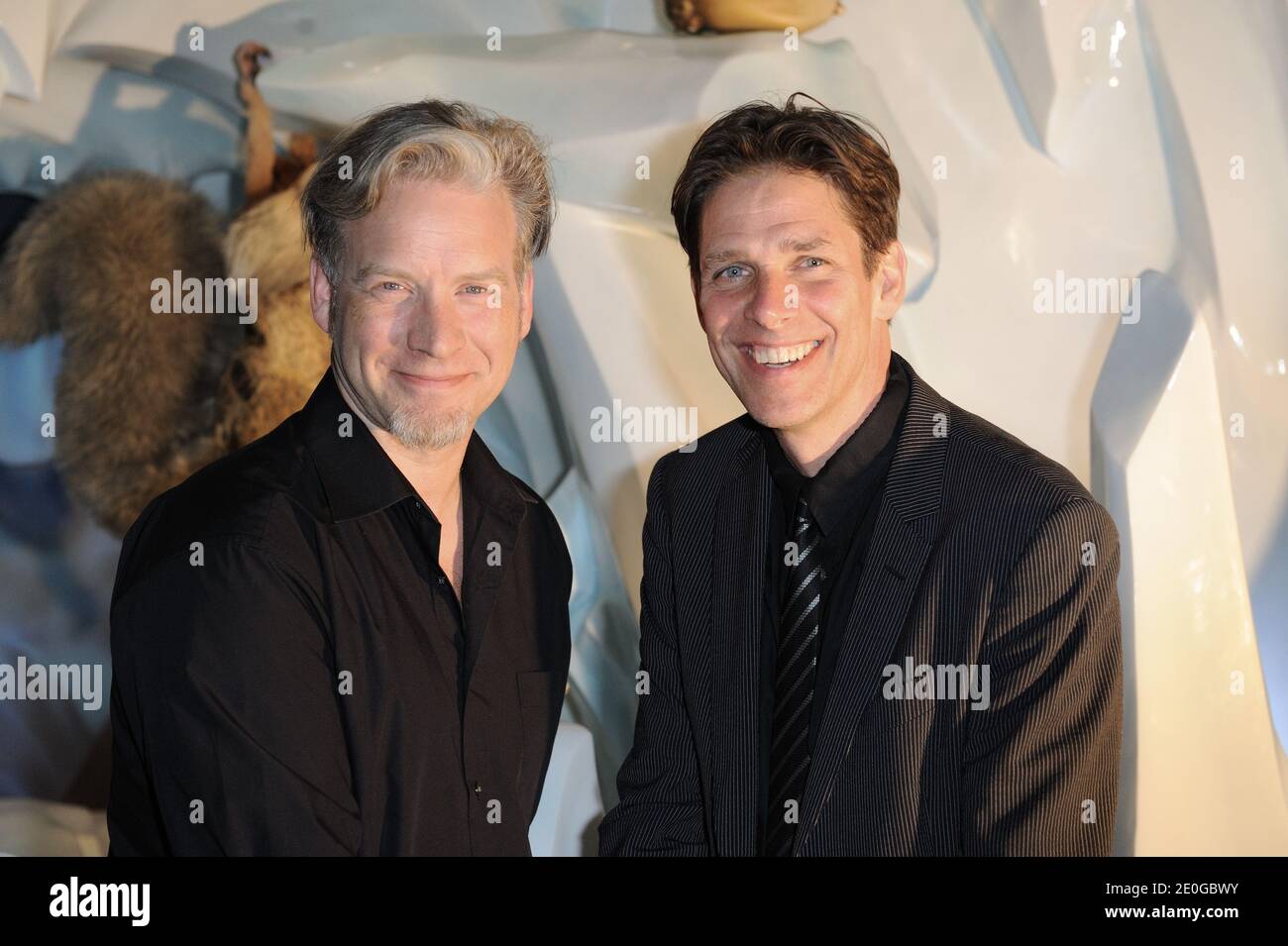 Peter de Seve, Mike Defeo during the unveiling of Scrat wax at Musee ...