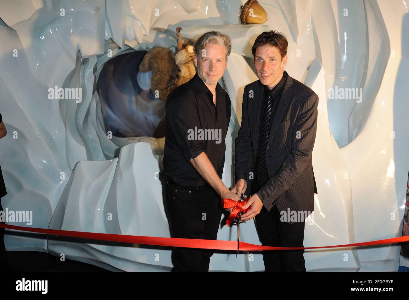 Peter de Seve, Mike Defeo during the unveiling of Scrat wax at Musee ...