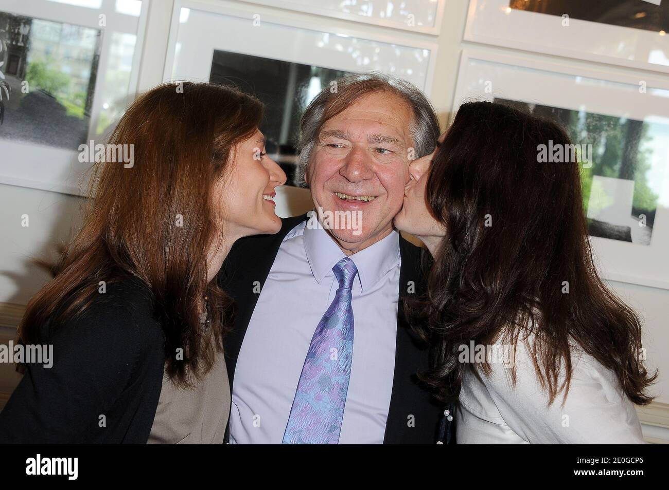 Pierre Santini with his daughters Marina and Adriana posing during a ...