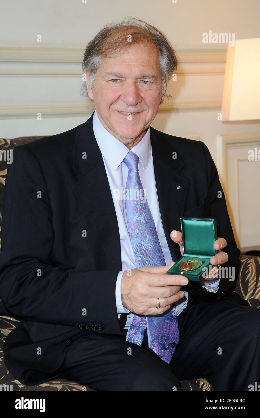 Pierre Santini posing during a medal ceremony held at the City Hall ...