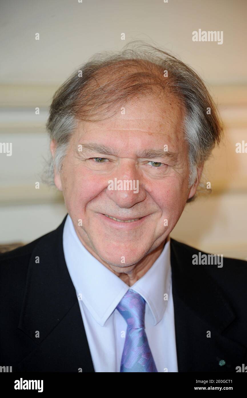 Pierre Santini posing during a medal ceremony held at the City Hall ...
