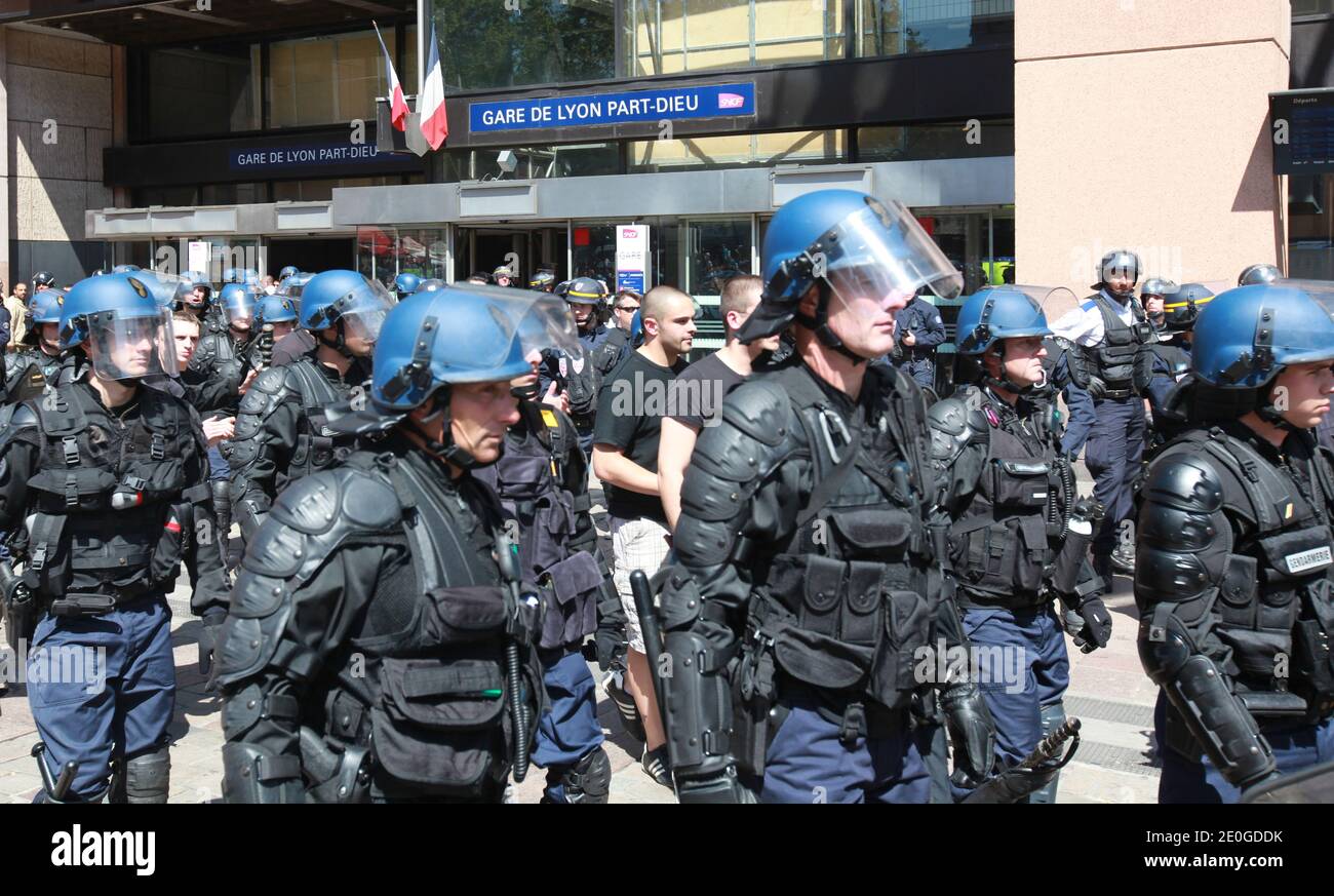 Anti-riot forces detain protestors during a forbidden demonstration of ...
