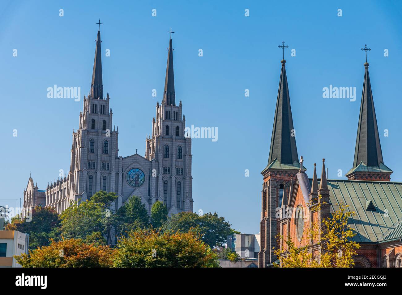 Jeil church viewed behind cathedral of our lady of Lourdes at Daegu ...