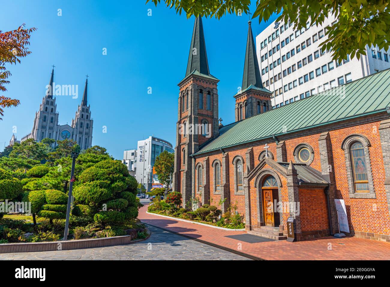Jeil church viewed behind cathedral of our lady of Lourdes at Daegu ...