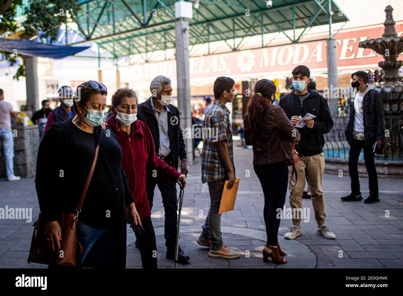 HERMOSILLO, MEXICO DECEMBER 31: People walk the streets of downtown for ...