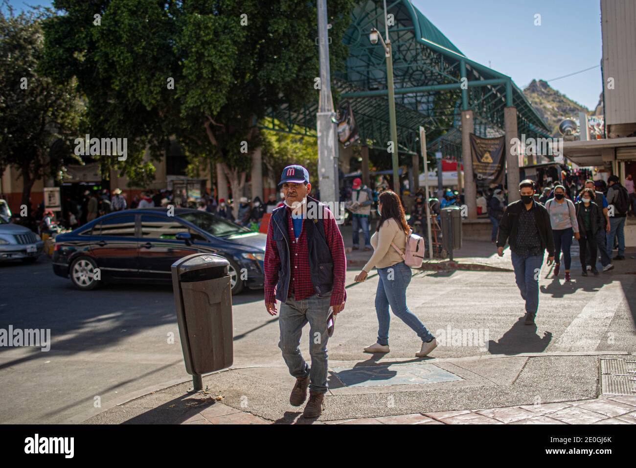 HERMOSILLO, MEXICO DECEMBER 31: People walk the streets of downtown for ...