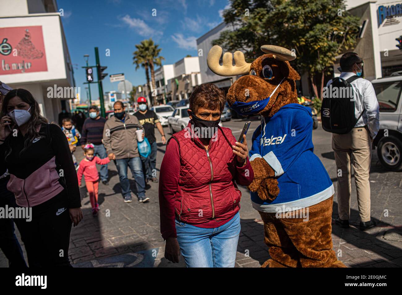HERMOSILLO, MEXICO DECEMBER 31: People walk the streets of downtown for ...