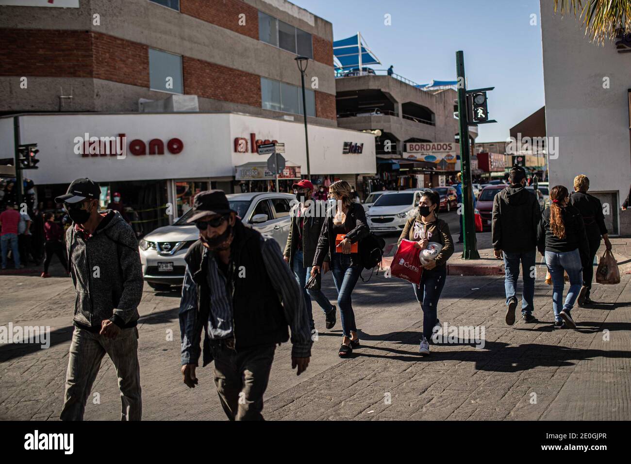 HERMOSILLO, MEXICO DECEMBER 31: People walk the streets of downtown for ...