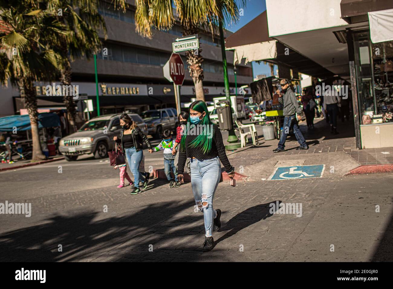 HERMOSILLO, MEXICO DECEMBER 31: People walk the streets of downtown for ...