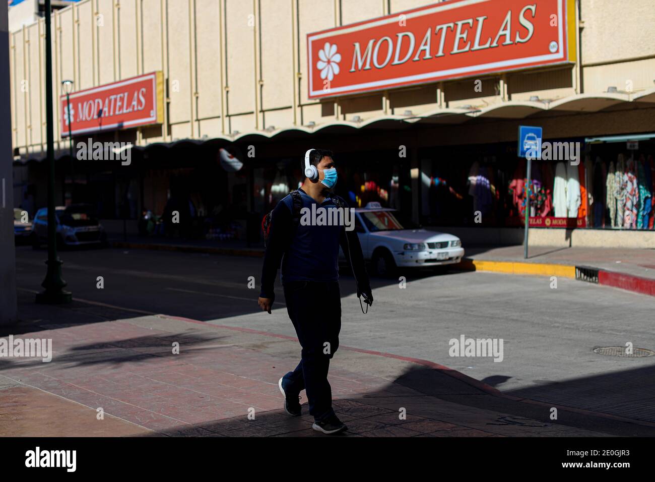 HERMOSILLO, MEXICO DECEMBER 31: People walk the streets of downtown for ...
