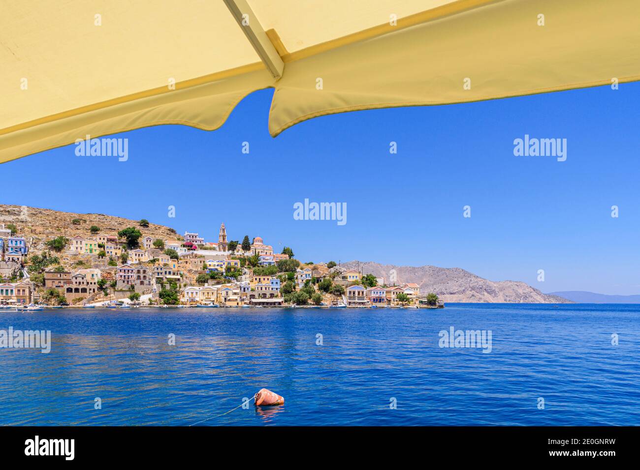 Framed views of the pretty area of Harani on Symi Island, Greece Stock ...