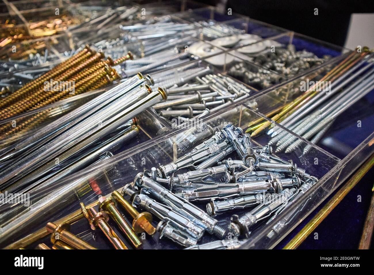 Different Screws and other Parts sorted in a box Stock Photo - Alamy