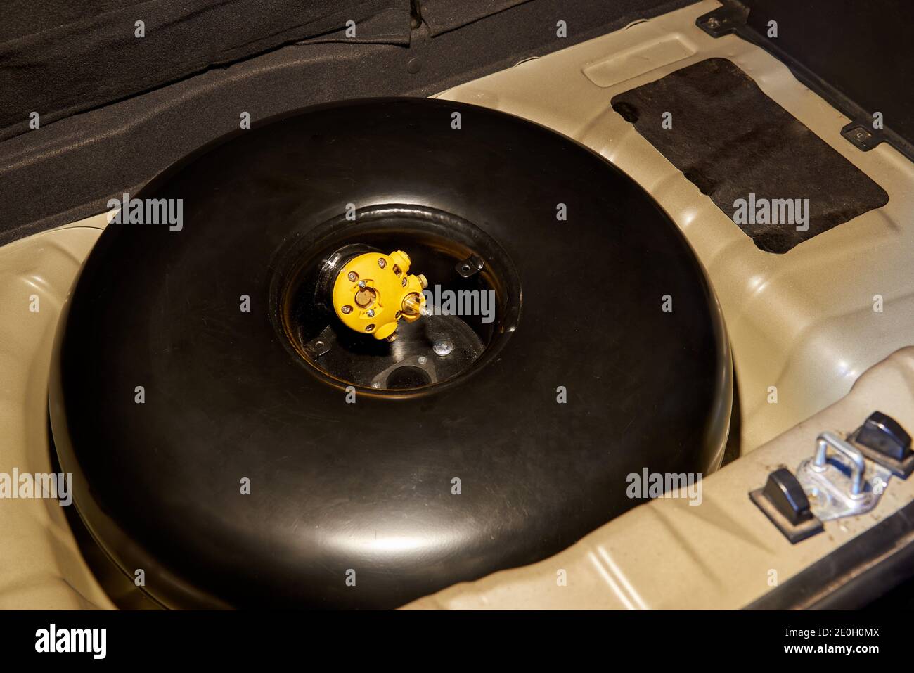 Gas bottle in the trunk of a car. Installation of gas equipment Stock ...