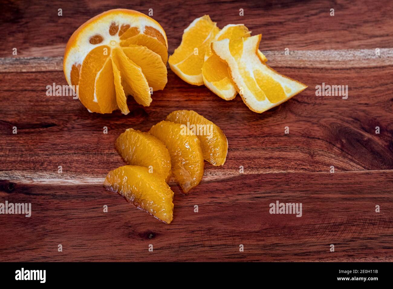 Juicy cut peeled orange hi-res stock photography and images - Alamy