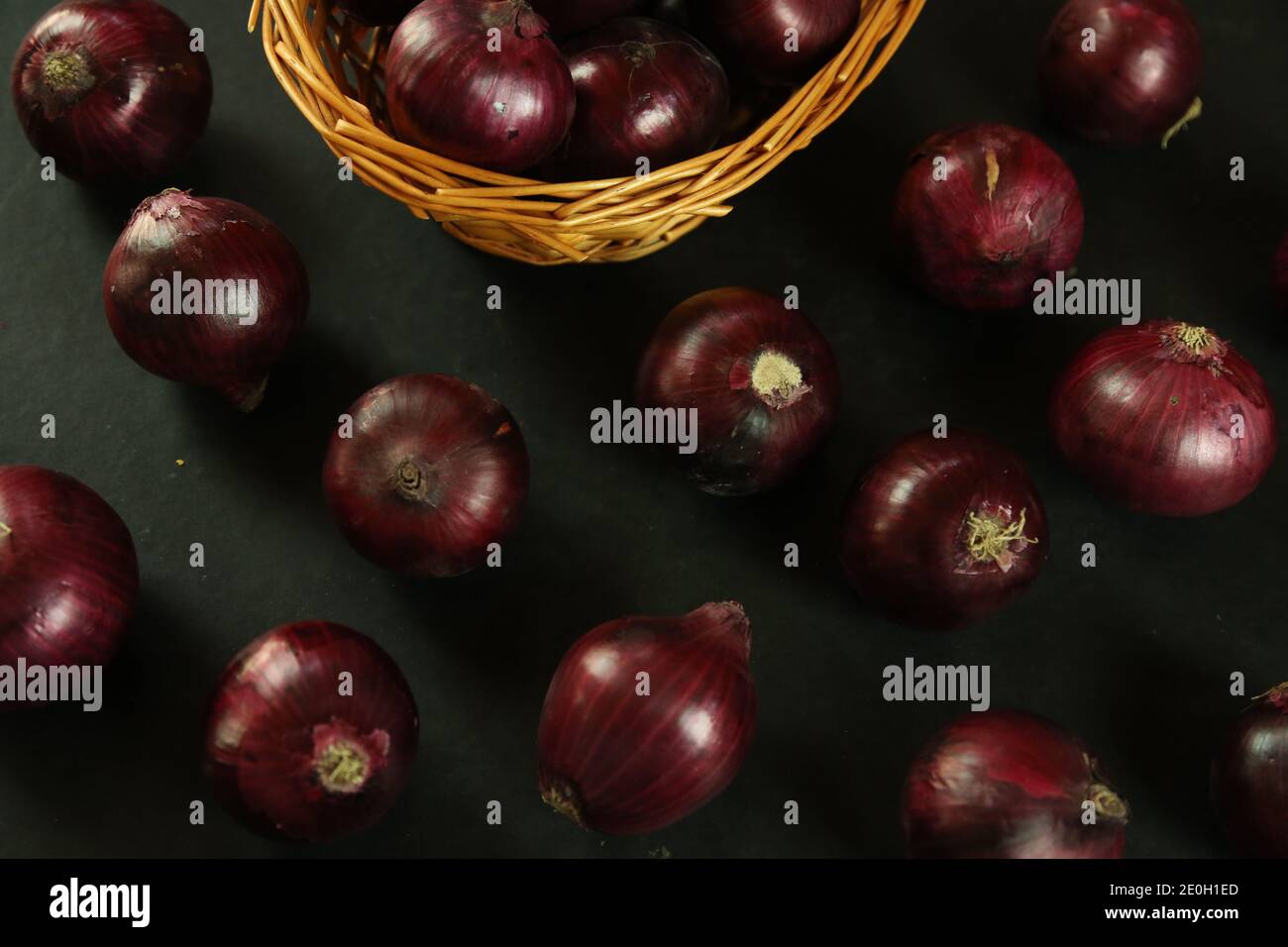 sweet red onions on background Stock Photo - Alamy