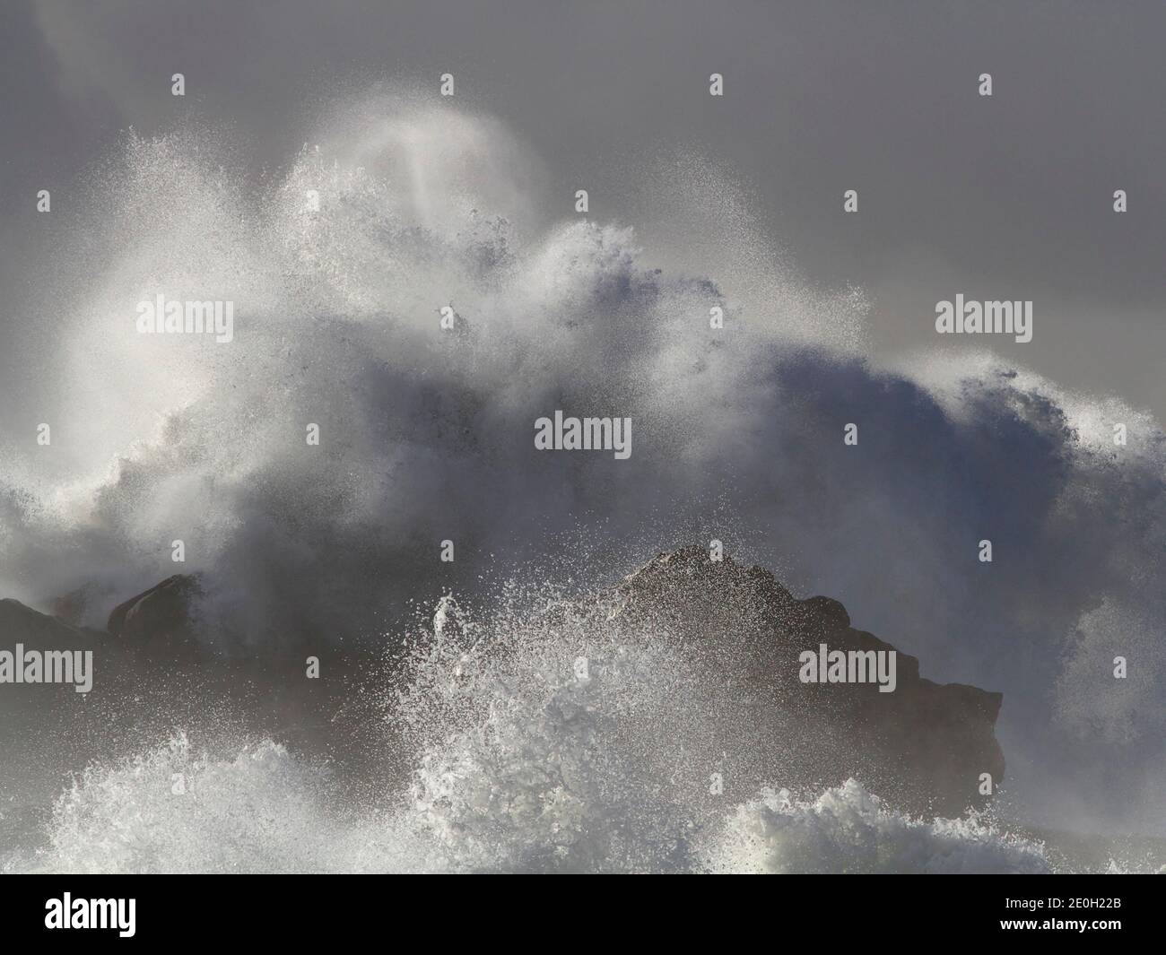 Storm on the coast seeig big wave breaking over rocks and cliffs seeing ...