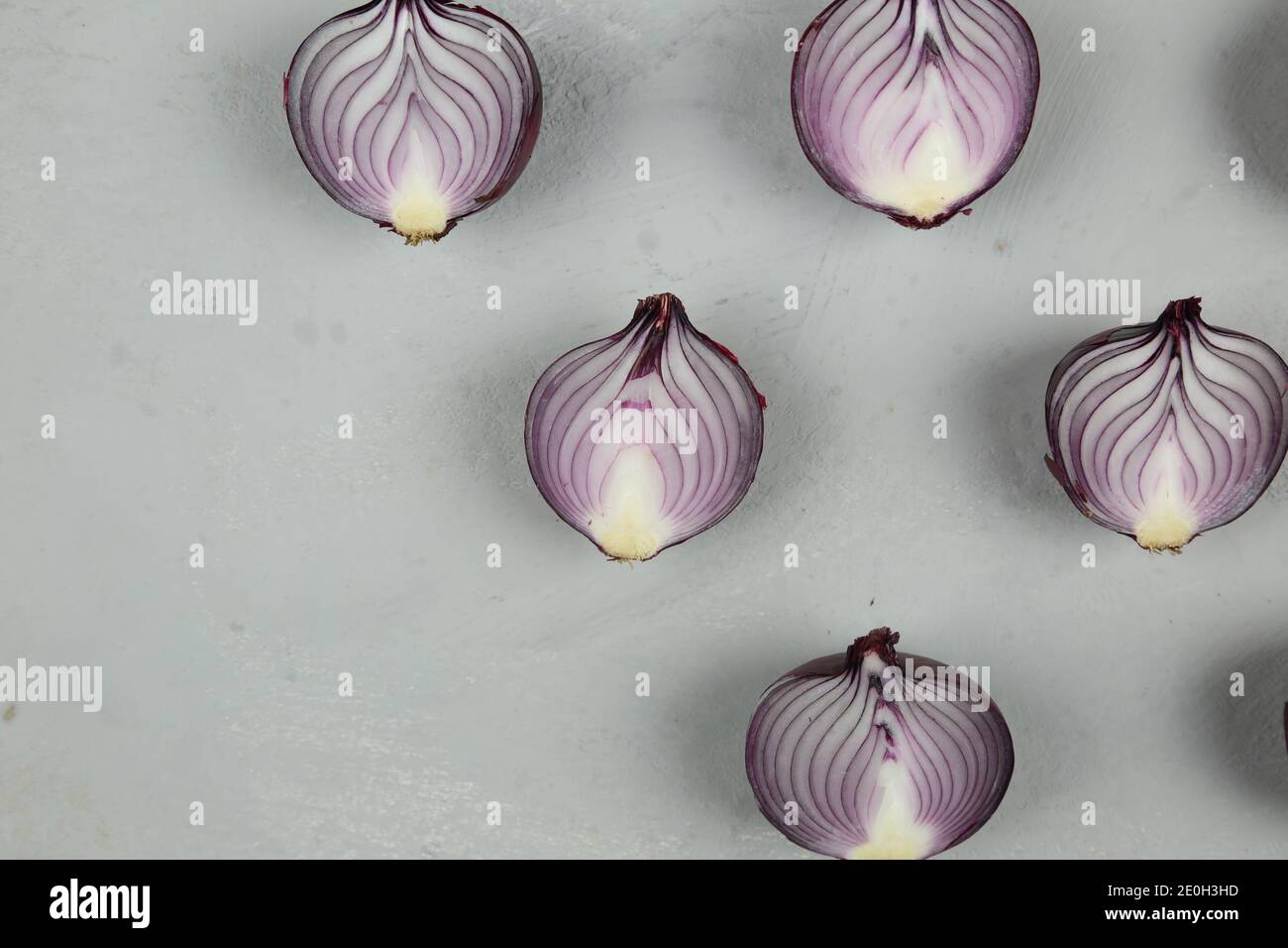 sweet red onions on background Stock Photo - Alamy