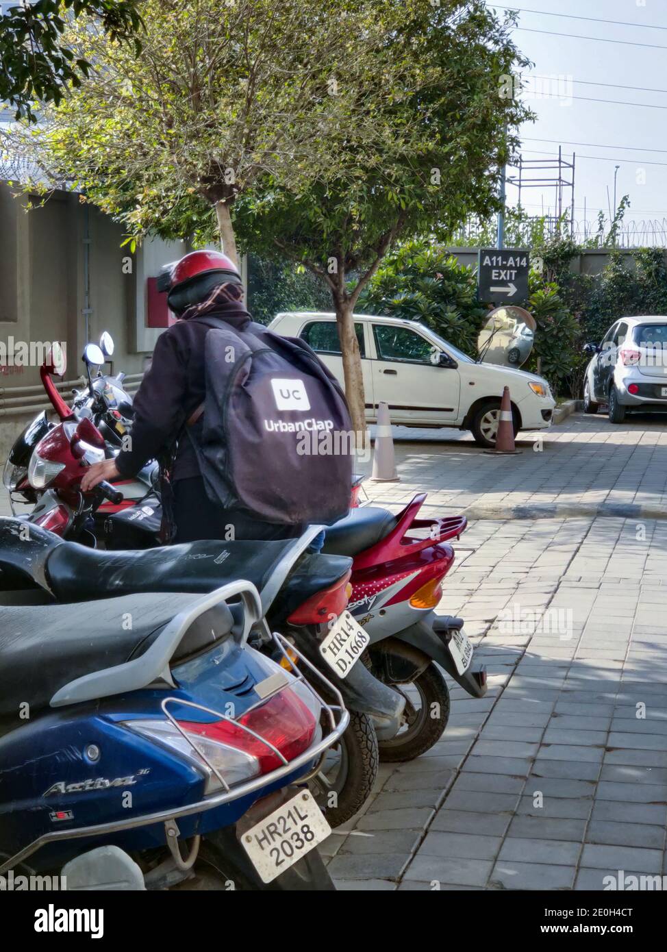 Indian delivery boy on bike hi-res stock photography and images - Alamy