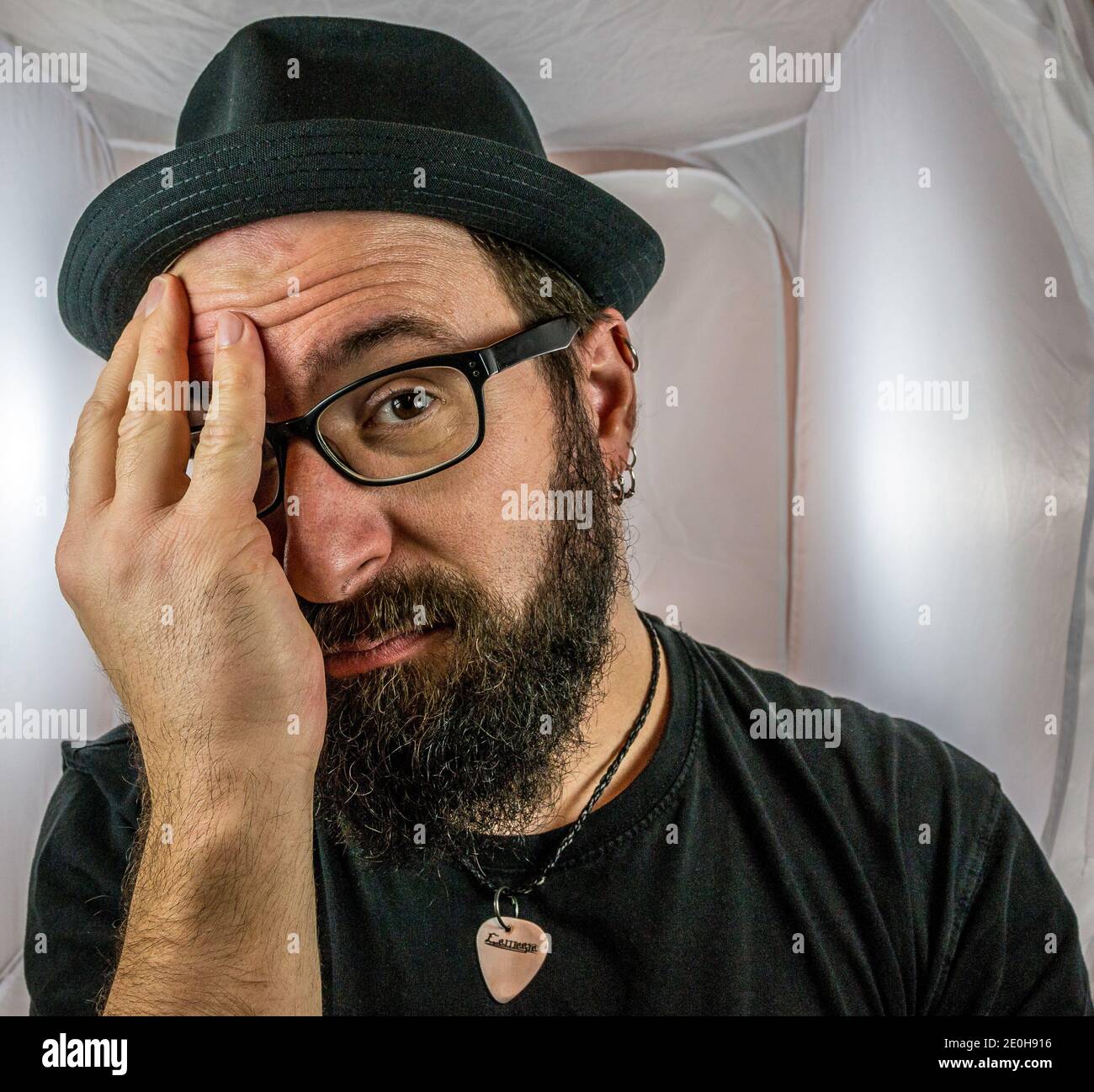 A bearded and desperately looking man with empty eyes Stock Photo - Alamy