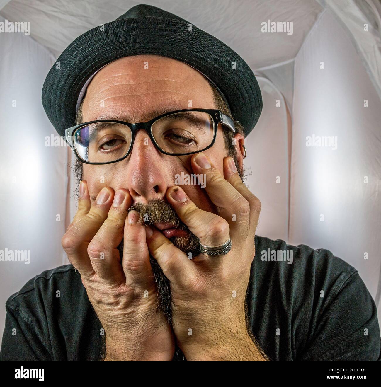 Desperately looking hi-res stock photography and images - Alamy