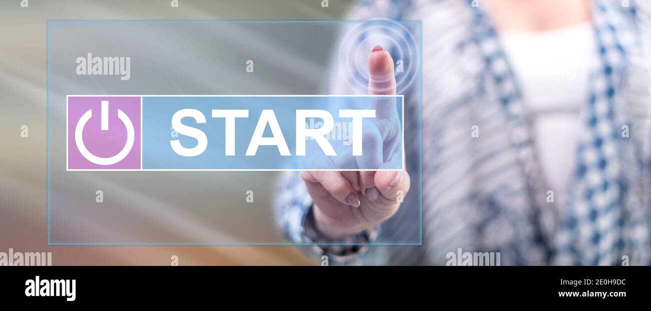 Woman touching a start concept on a touch screen with her finger Stock ...