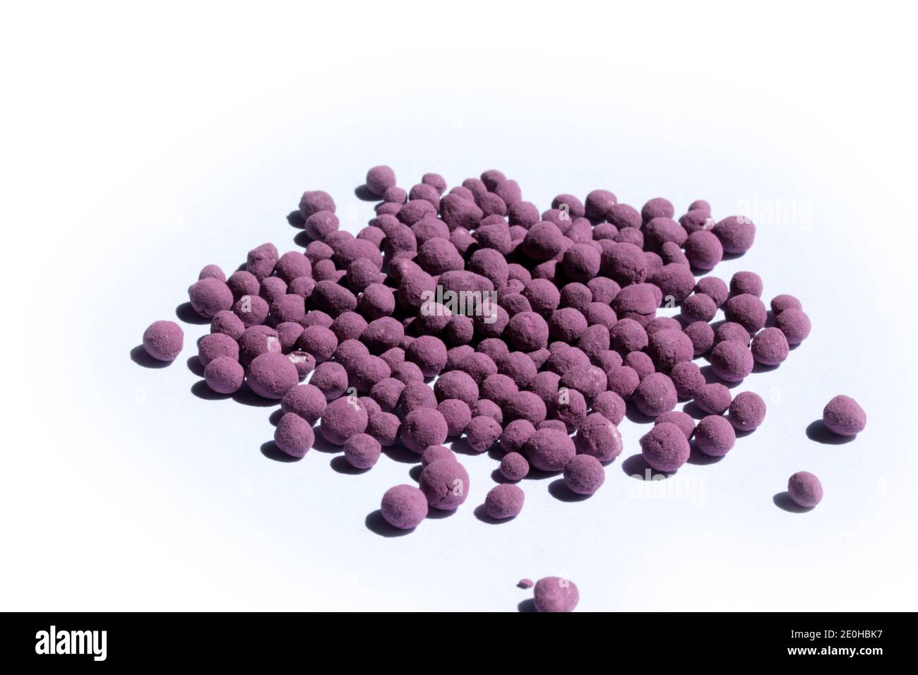 powder food colors on a white background Stock Photo - Alamy