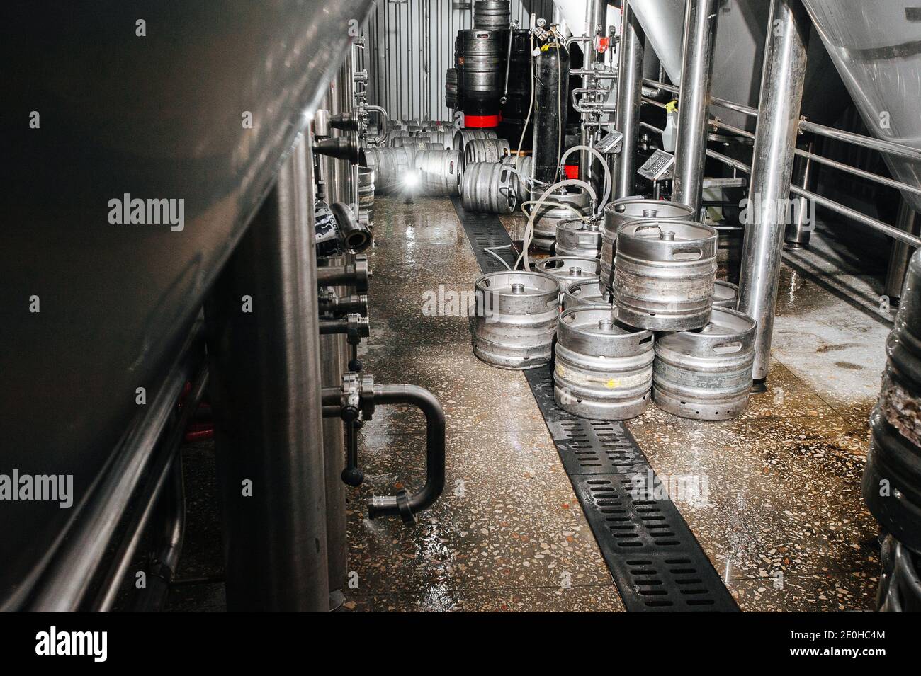 The interior of the brewery. Modern beer factory. Rows of steel ...