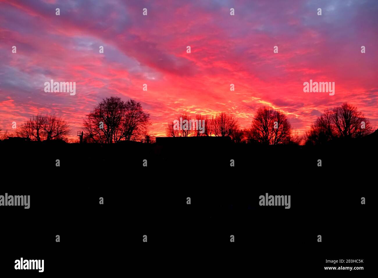 A pink sunrise above Nordbahnstrasse Berlin Wedding on december 15 ...
