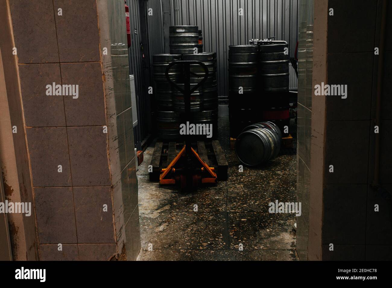 Steel industrial stack of beer kegs against Stock Photo - Alamy