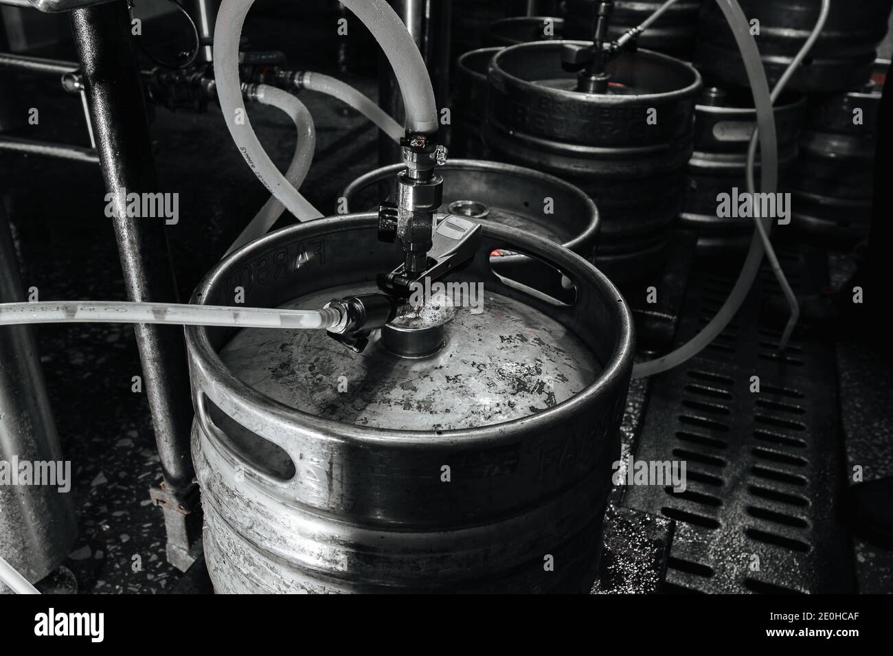 Steel industrial stack of beer kegs against. Modern brewery and ...