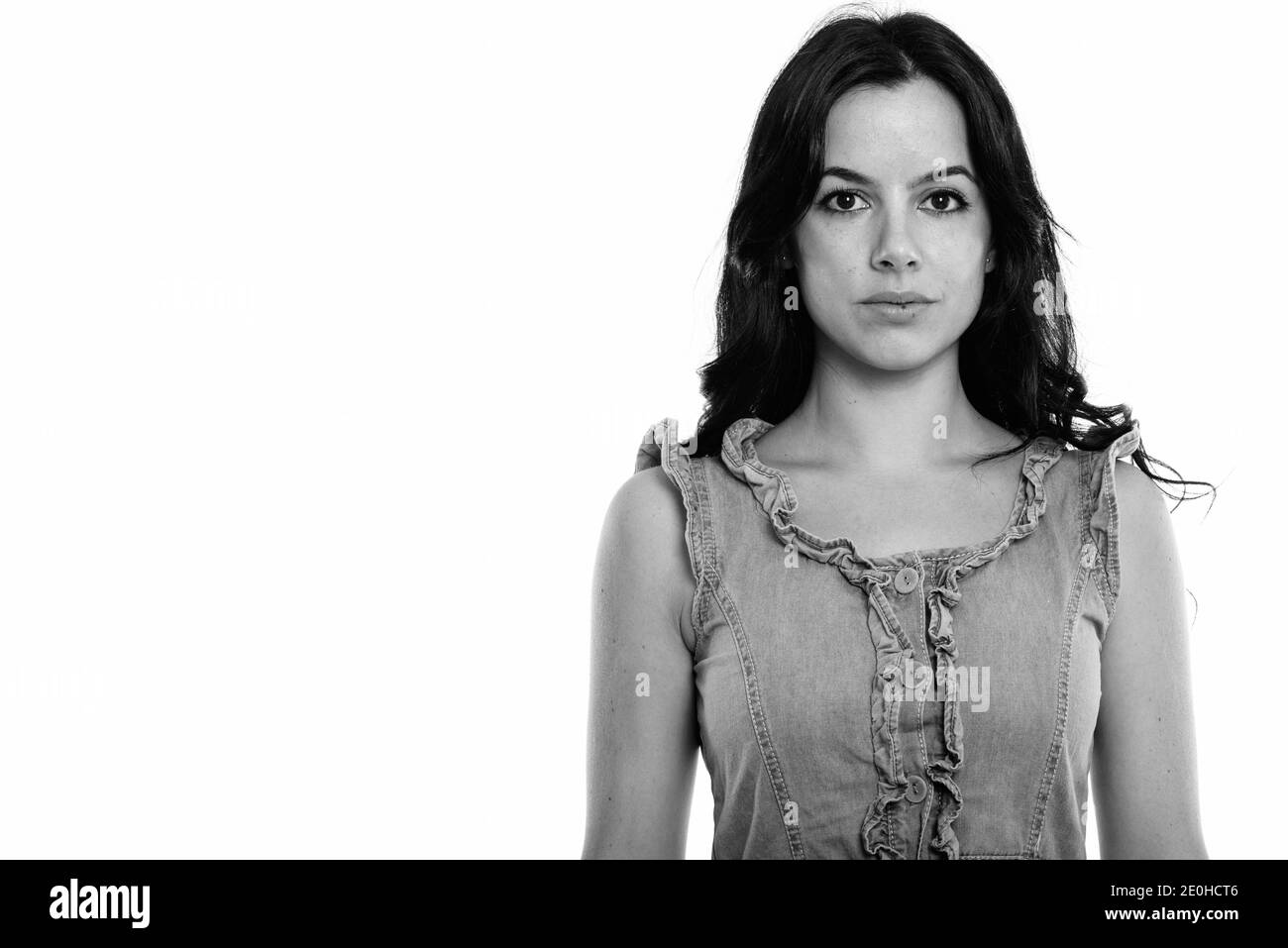 Studio shot of young beautiful Spanish woman Stock Photo - Alamy