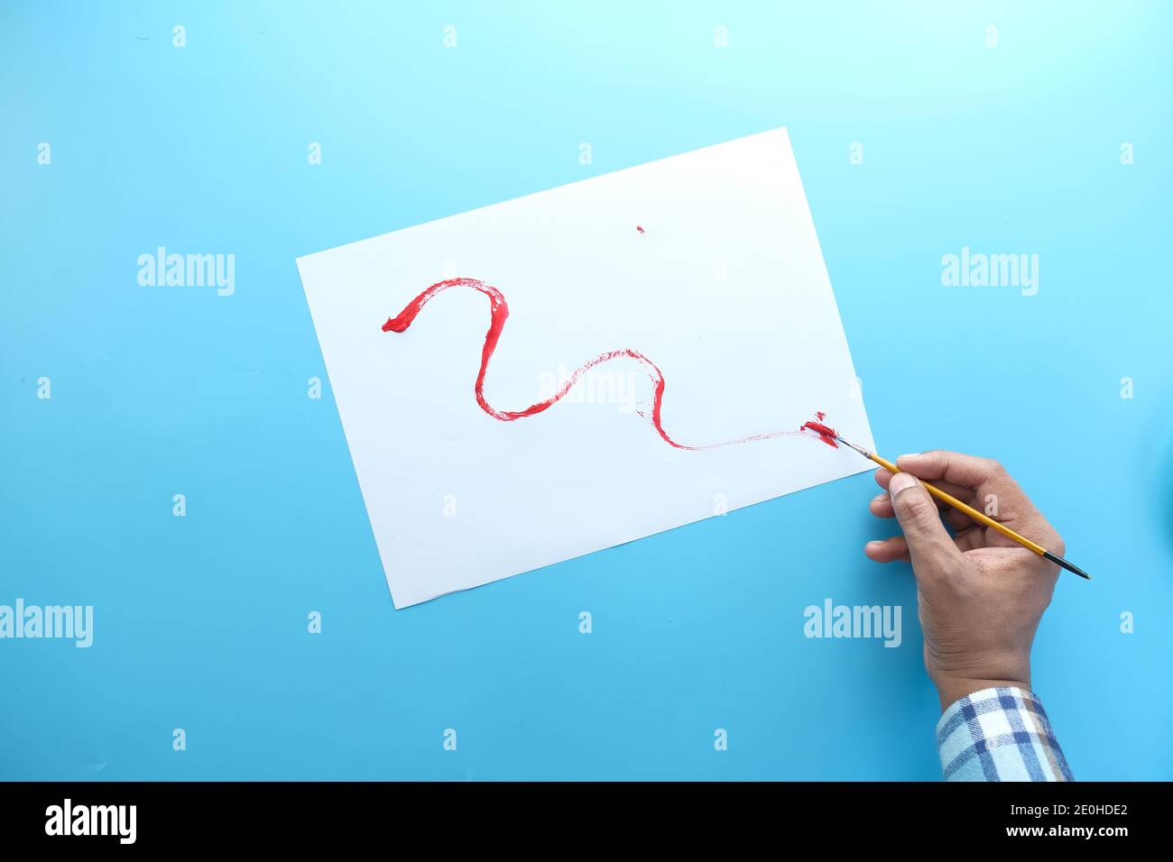 drawing with art pencil on a page, top down Stock Photo - Alamy