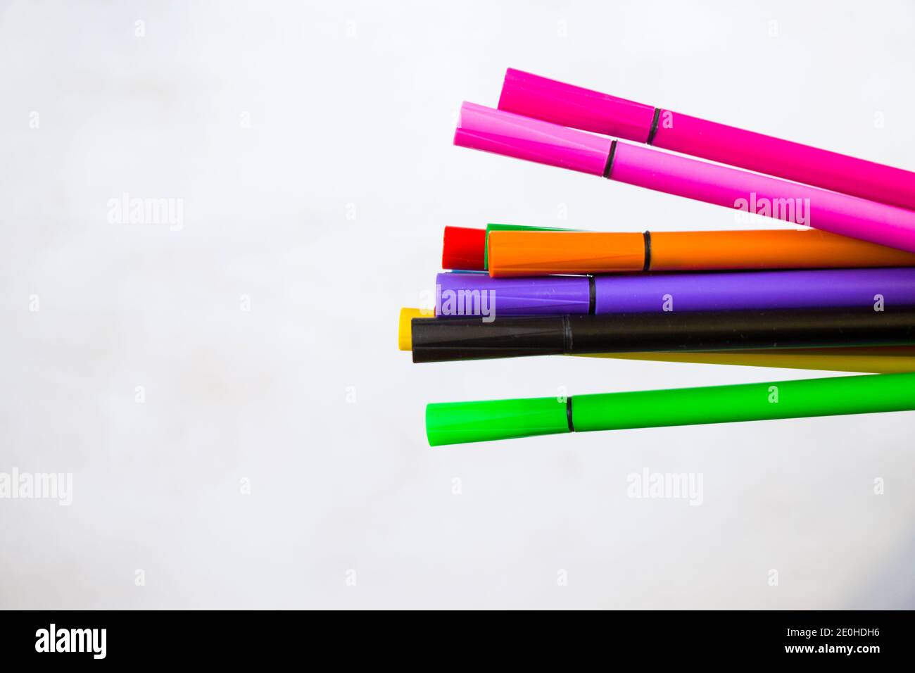 Large group of colorful drawing markers for sketching on the white ...